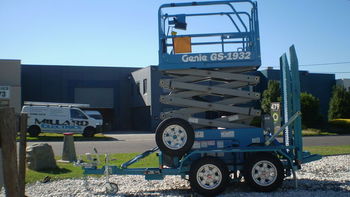 New Genie GS1932 Narrow Electric Scissor Lift with Trailer | Statewide ...